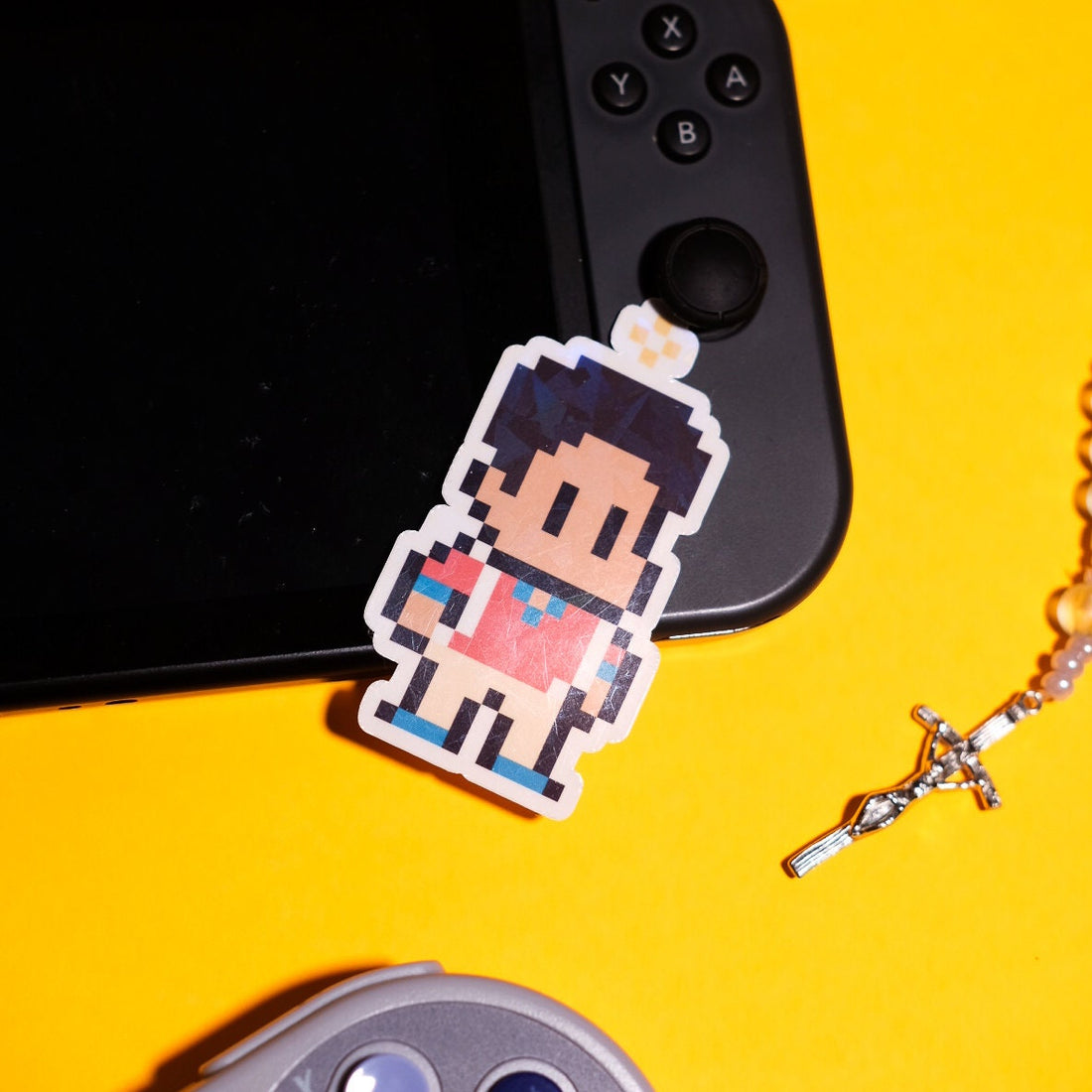 Glittery Saint Carlo Acutis Video Game Sticker – Saint Sprites